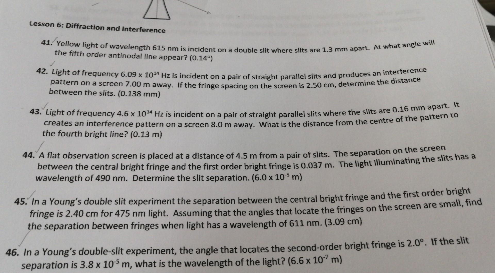 Solved 41. Yellow light of wavelength 615 nm is incident on | Chegg.com