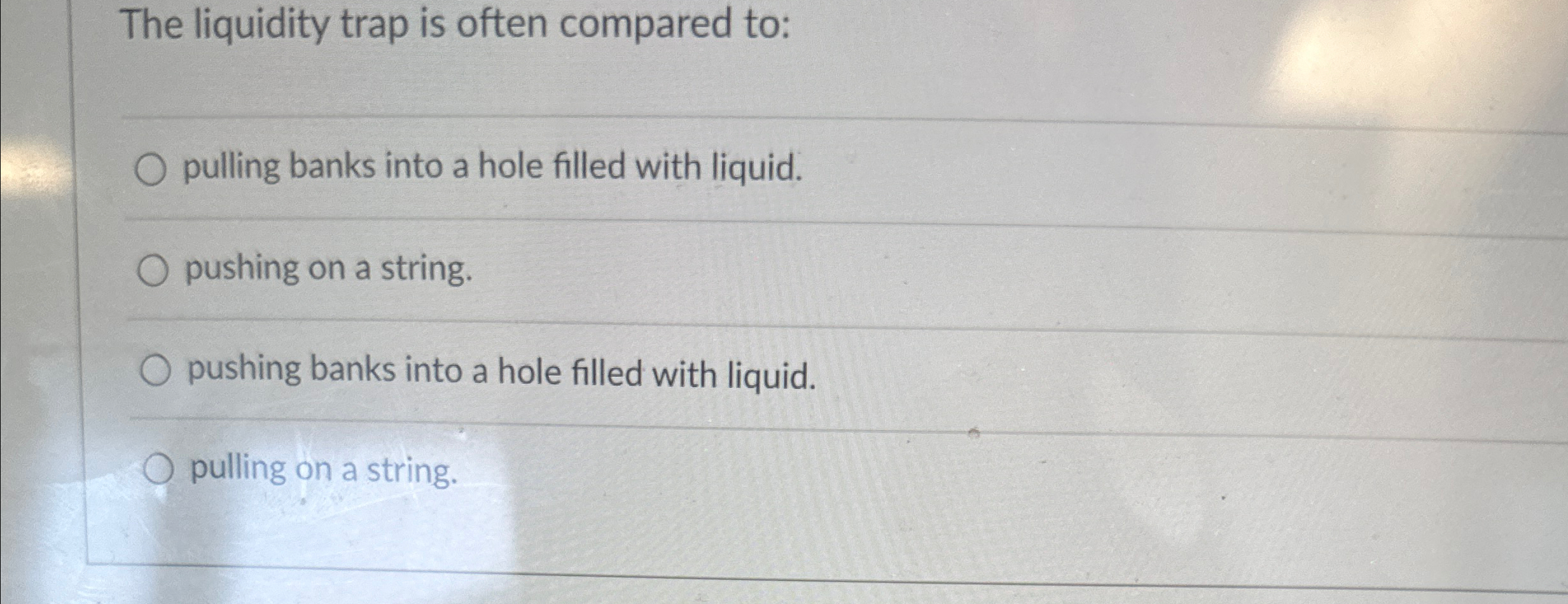 Solved The liquidity trap is often compared to:pulling banks | Chegg.com