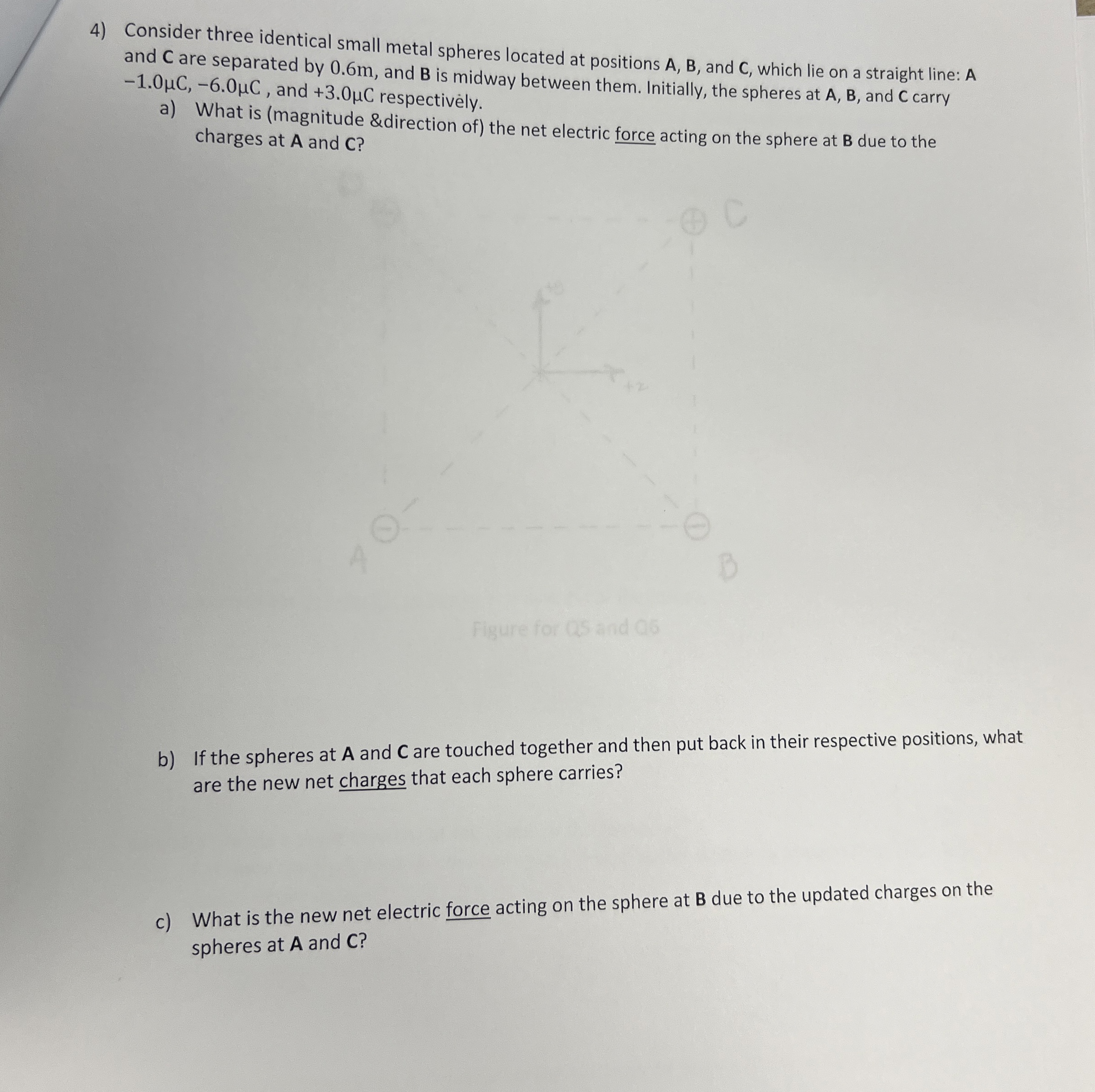 Solved Consider three identical small metal spheres located | Chegg.com