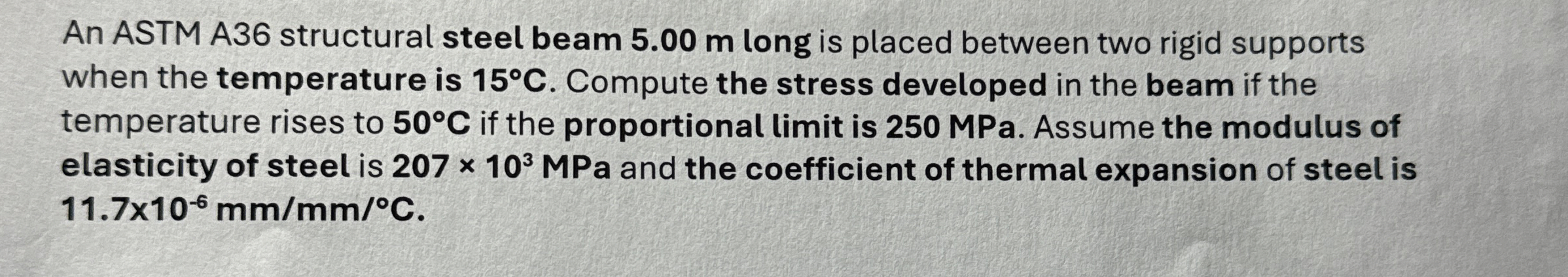 Solved An ASTM A36 ﻿structural steel beam 5.00 ﻿m long is | Chegg.com