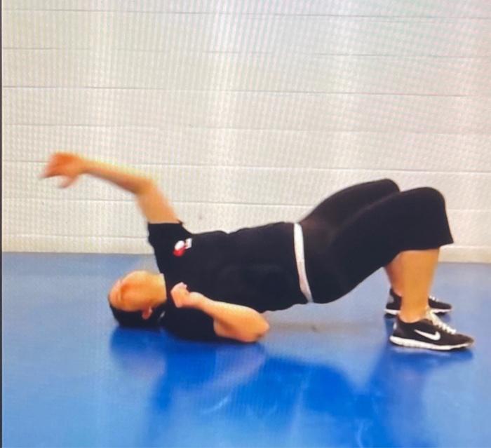 In the exercise: Supine bridge with reach: what | Chegg.com