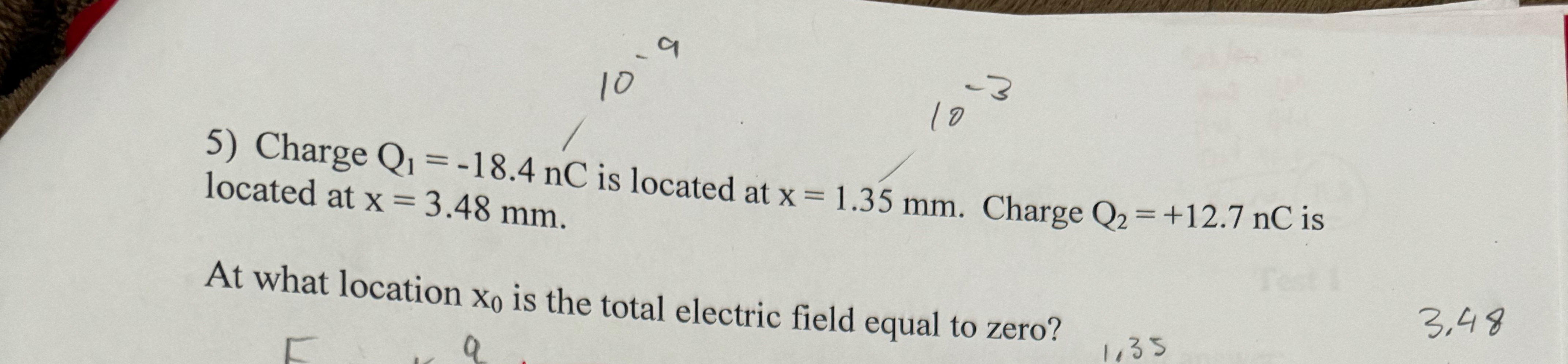 Solved Charge Q1=-18.4nC ﻿is located at x=1.35mm. ﻿Charge | Chegg.com