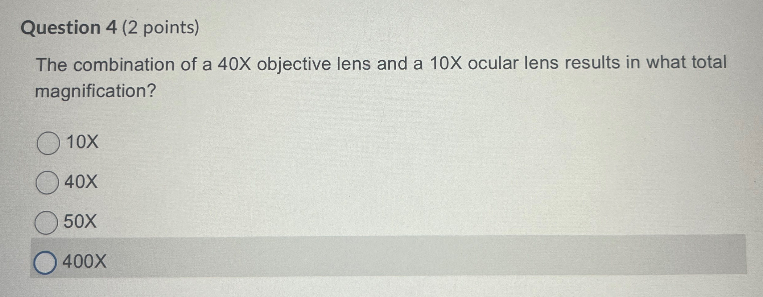 Solved Question 4 (2 ﻿points)The combination of a 40X | Chegg.com