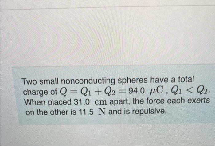 Solved Two small nonconducting spheres have a total charge | Chegg.com