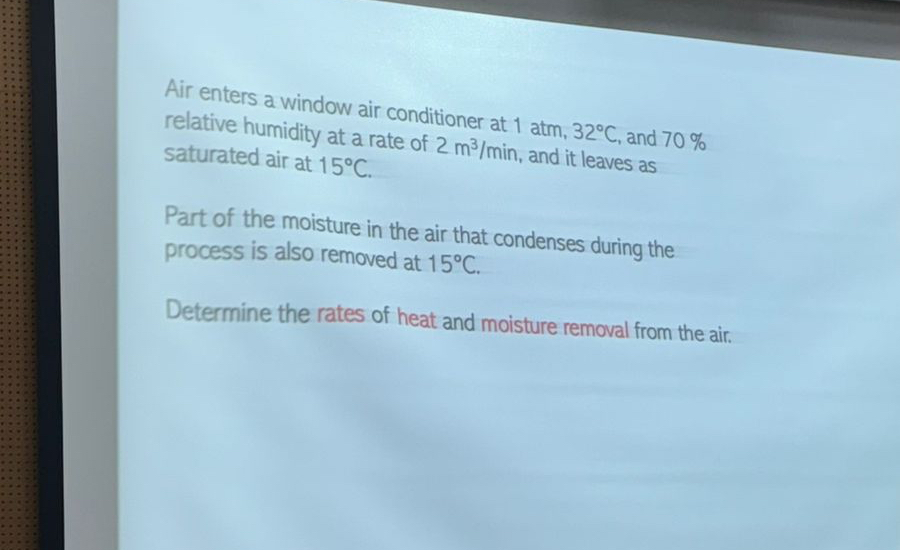 Solved Air enters a window air conditioner at 1atm,32°C, | Chegg.com