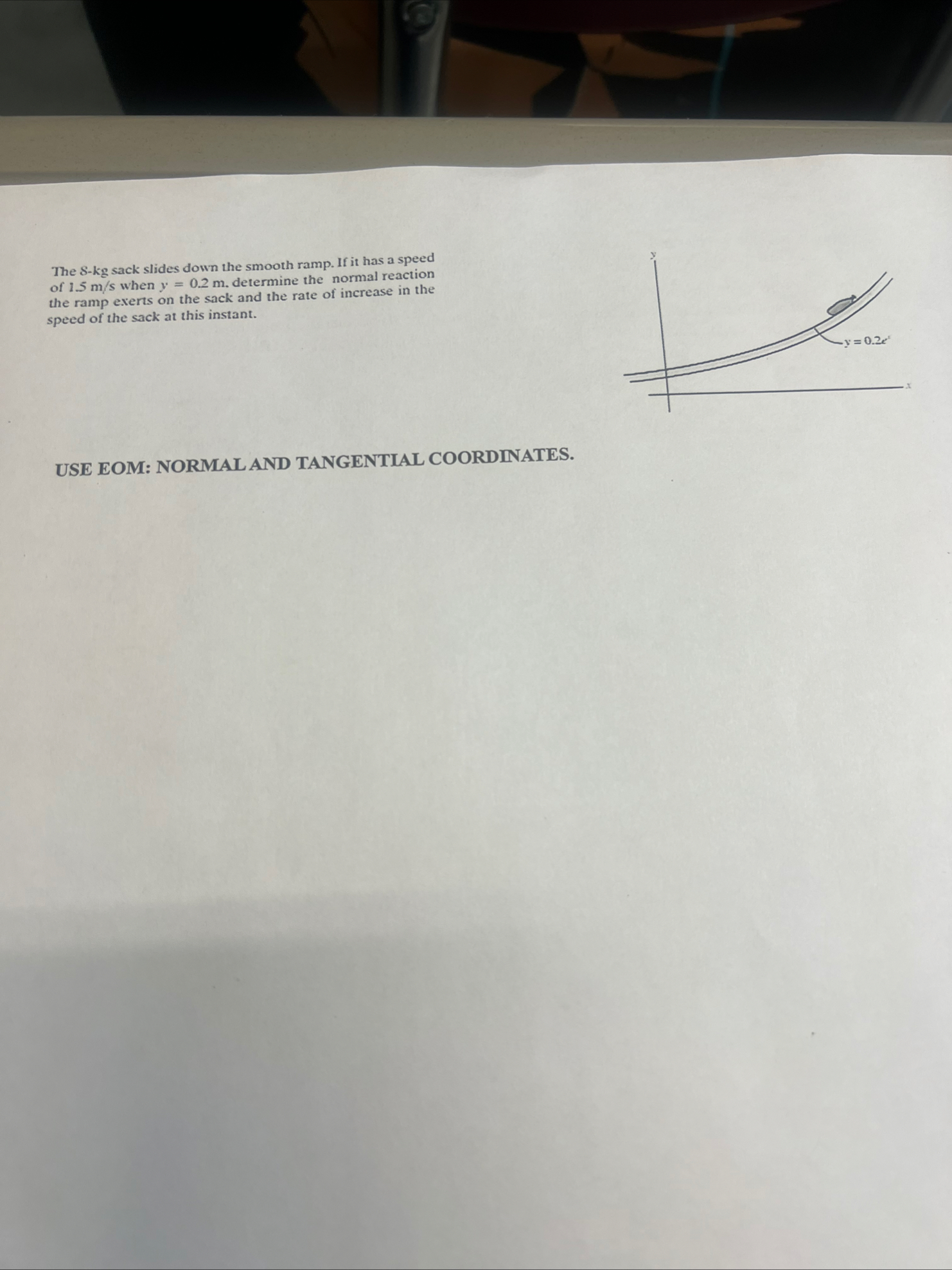 Solved The 8-kg sack slides down the smooth ramp. If it has | Chegg.com