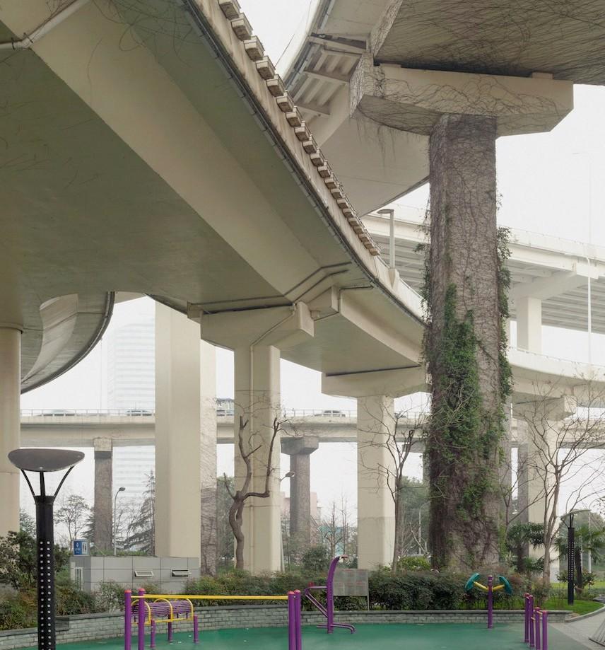 Solved Highway overpass columns appear precariously | Chegg.com