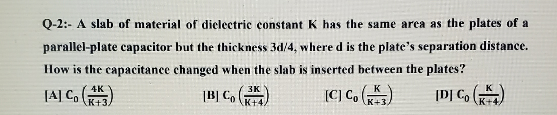 Solved Q-2:- ﻿A slab of material of dielectric constant K | Chegg.com