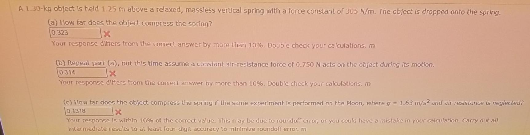 Solved A 1.30-kg object is held 1.25 m above a relaxed, | Chegg.com