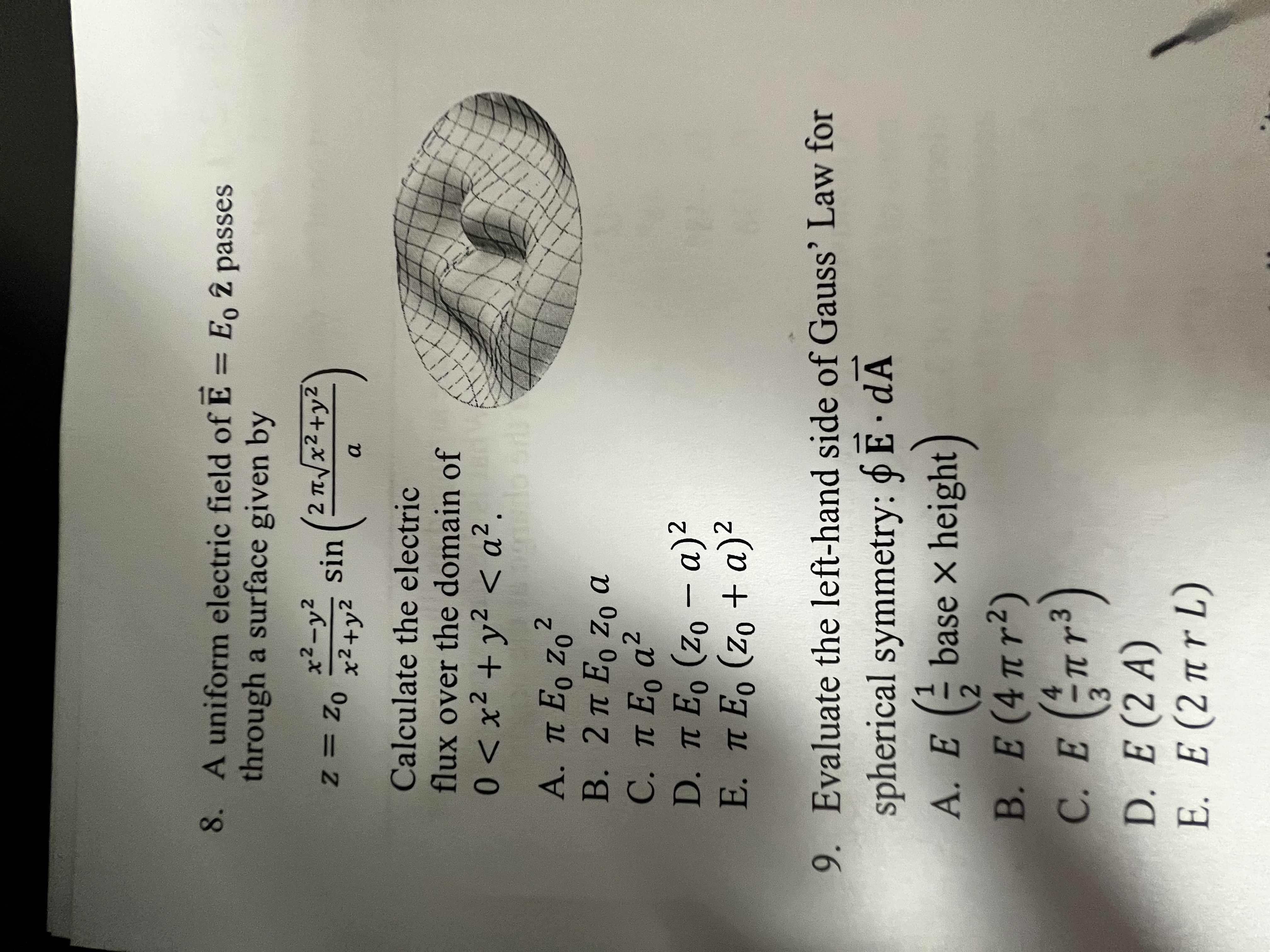 Solved A uniform electric field of vec(E)=E0hat(z) ﻿passes | Chegg.com