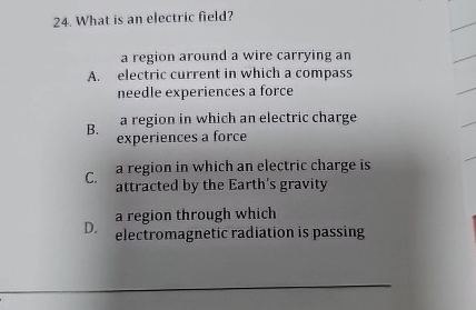 Solved What is an electric field?a region around a wire | Chegg.com