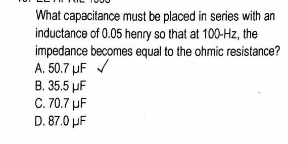 Solved What capacitance must be placed in series with an | Chegg.com