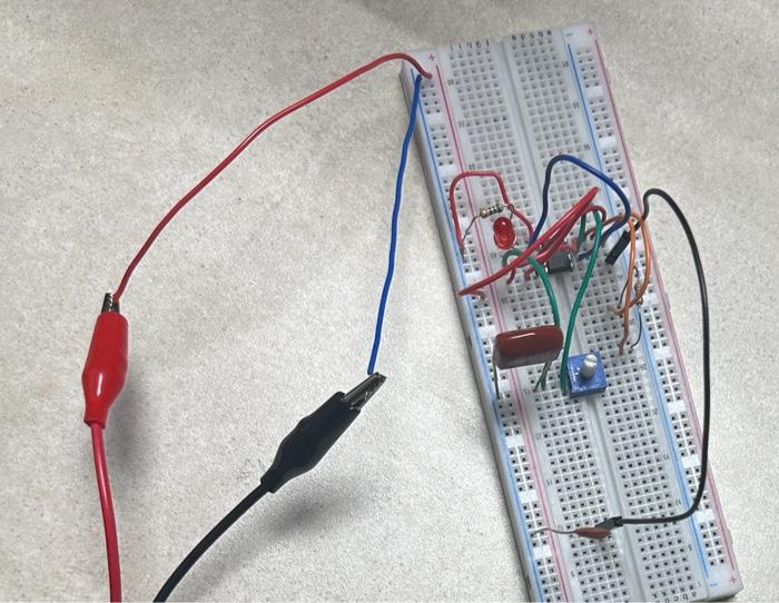 Solved Figure 2. Astable 555 timer circuit layout.[1] | Chegg.com