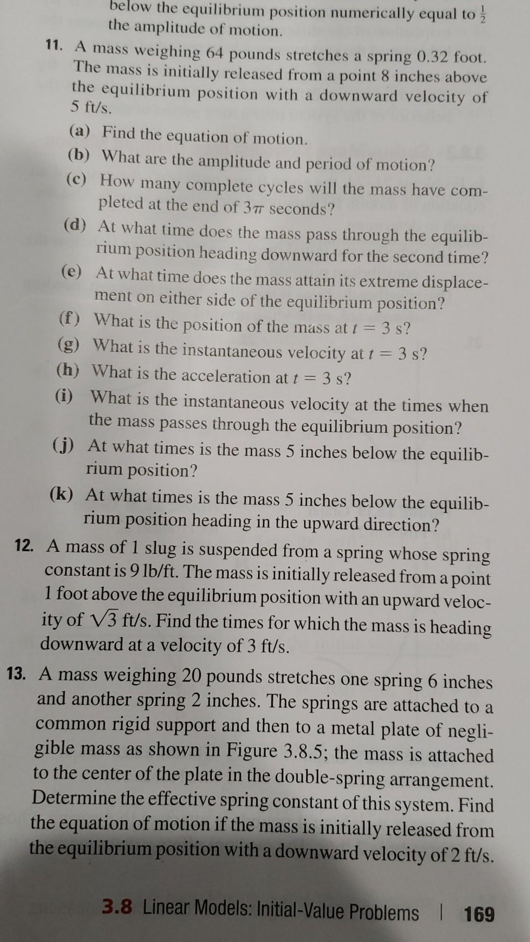 Solved below the equilibrium position numerically equal to | Chegg.com