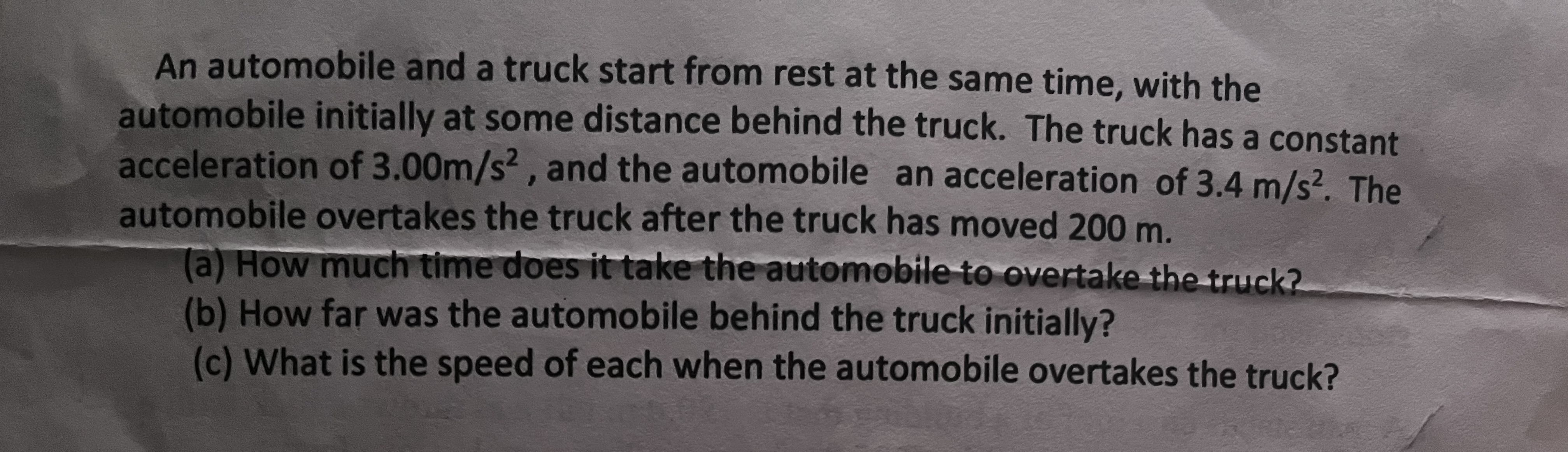 Solved An ﻿automobile and a truck start from rest at ﻿the | Chegg.com