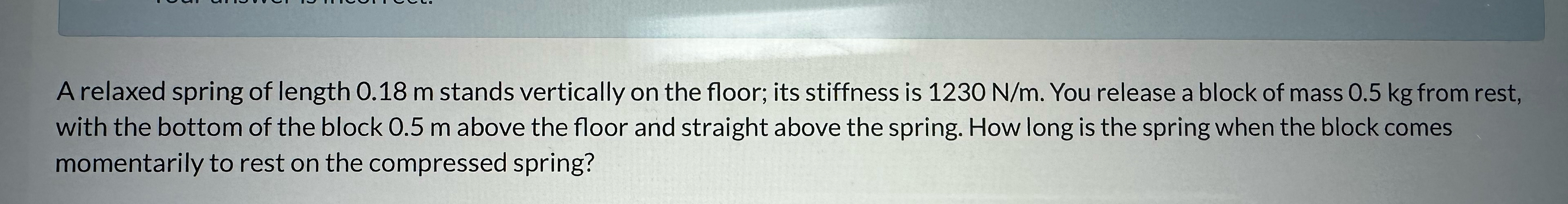 Solved A relaxed spring of length 0.18m ﻿stands vertically | Chegg.com