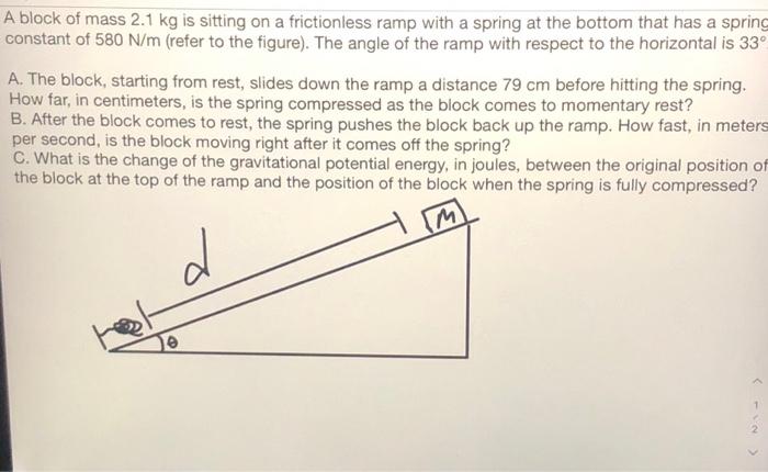 Solved A block of mass 2.1 kg is sitting on a frictionless | Chegg.com
