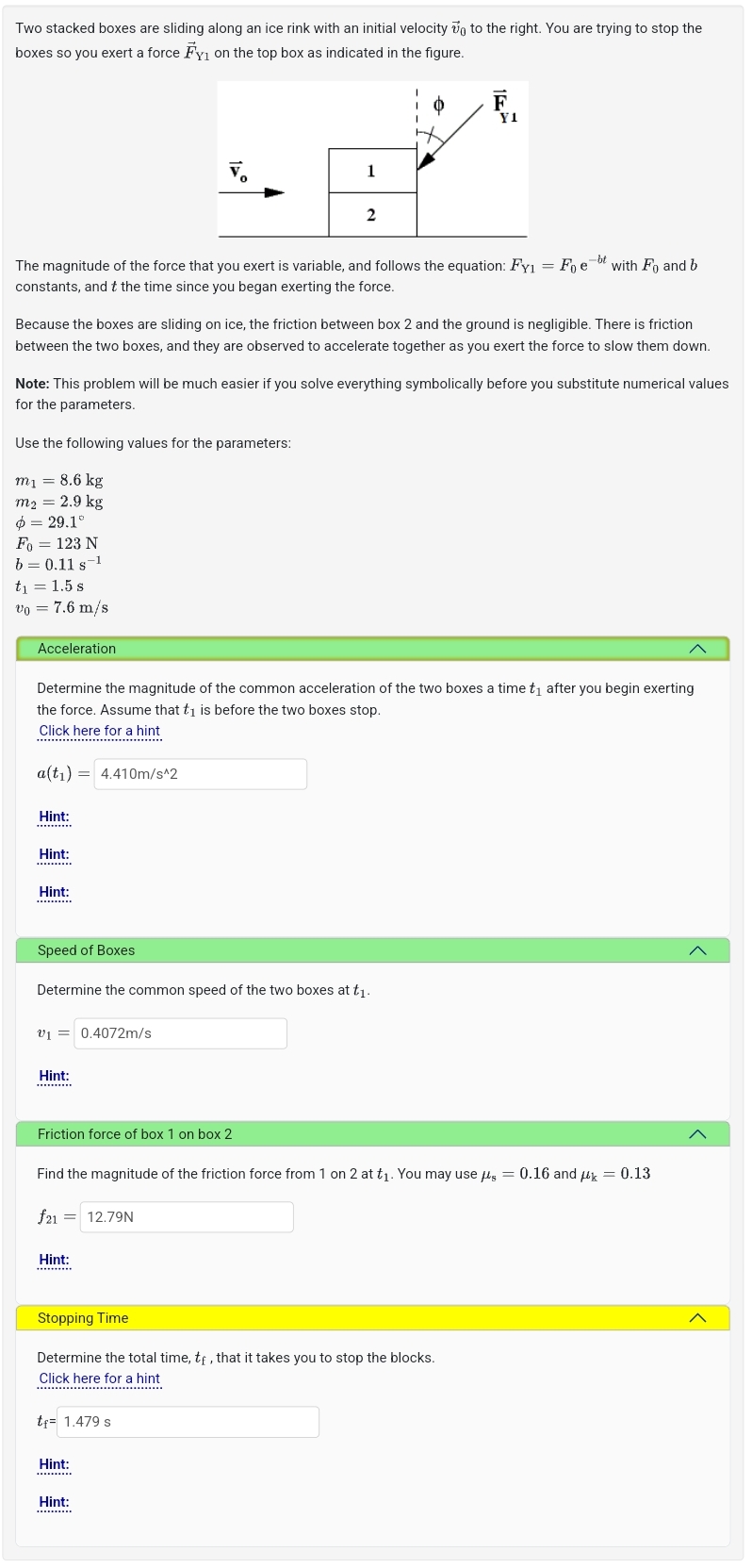 Solved Two stacked boxes are sliding along an ice rink with | Chegg.com