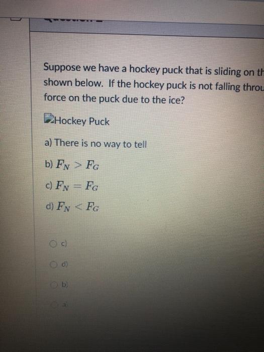 Solved hockey puck- what is the normal force on the puck due | Chegg.com