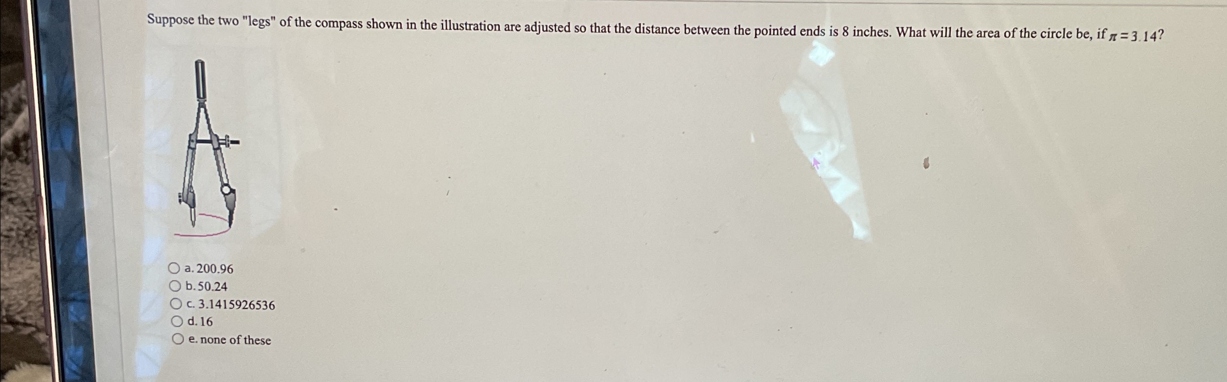 Solved Suppose the two "legs" of the compass shown in the | Chegg.com