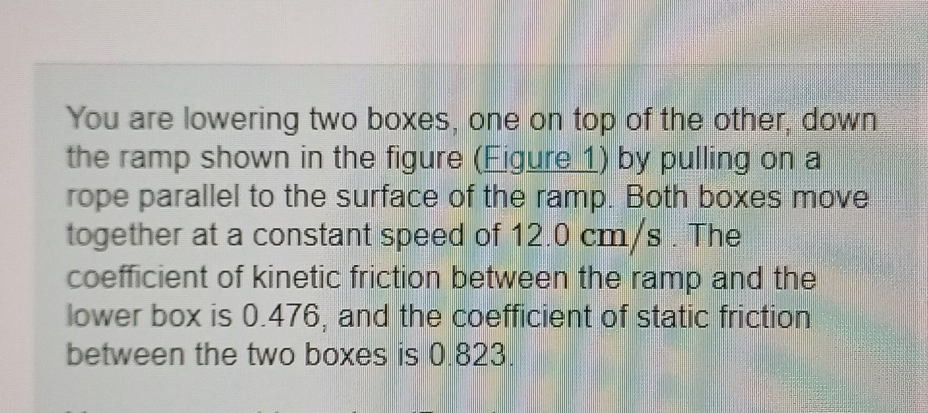 Solved You are lowering two boxes, one on top of the other, | Chegg.com