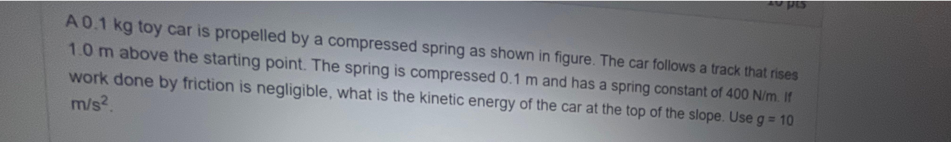 Solved A 0.1kg ﻿toy car is propelled by a compressed spring | Chegg.com