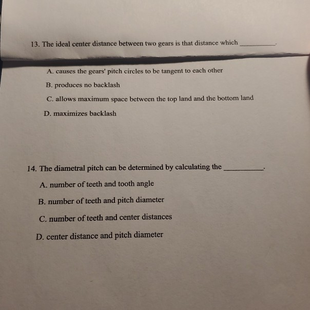 Solved 13. The ideal center distance between two gears is | Chegg.com