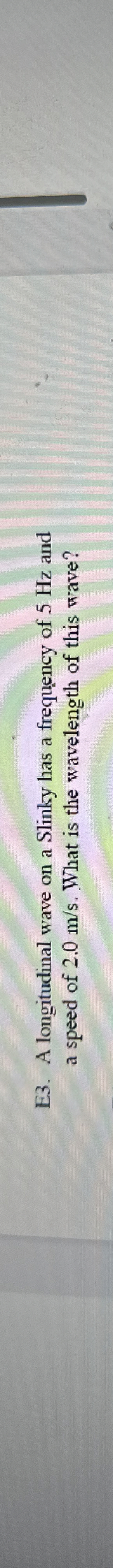 Solved E3. ﻿A longitudinal wave on a Slinky has a frequency | Chegg.com