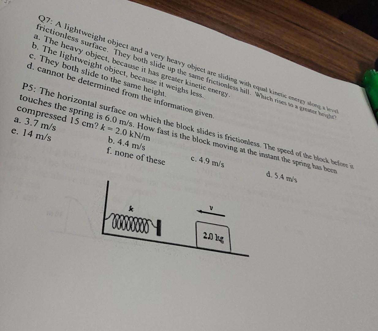 Solved Q7: A lightweight object and a very heavy object are | Chegg.com