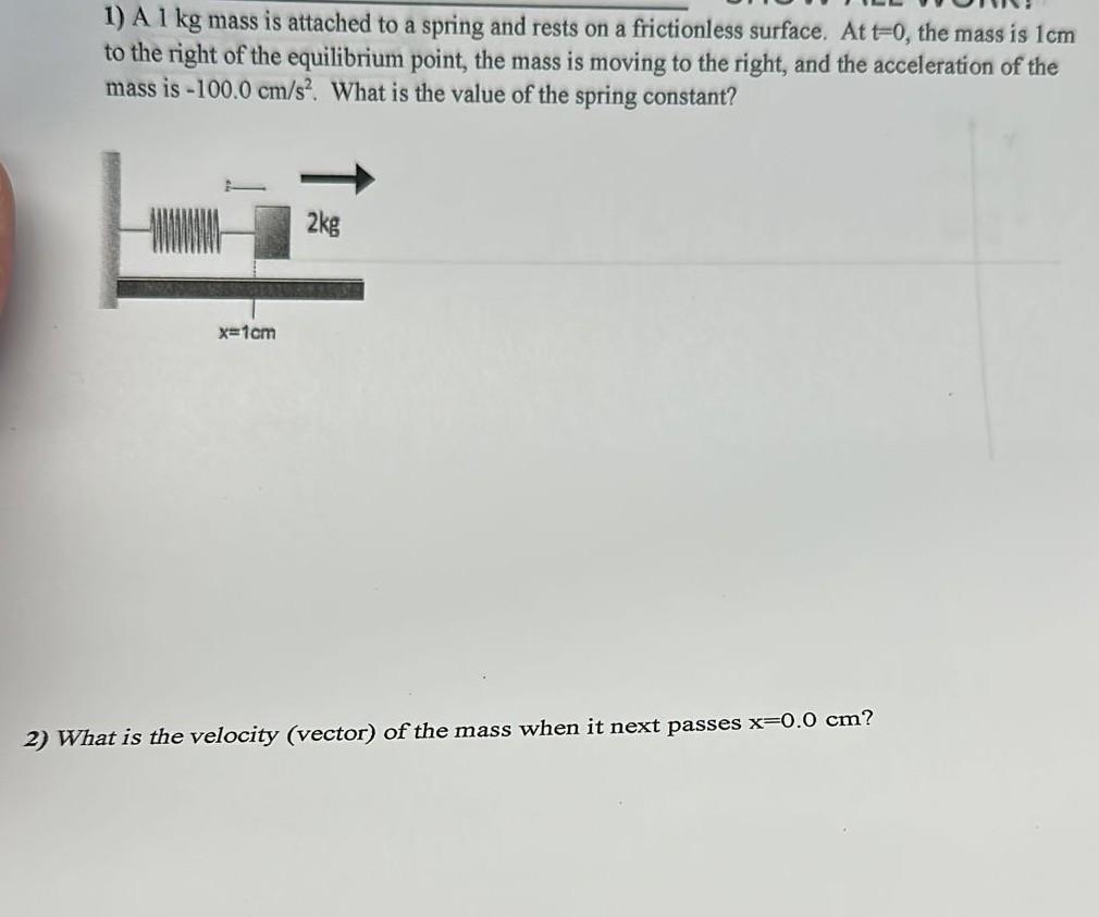 Solved 1) A 1 kg mass is attached to a spring and rests on a | Chegg.com