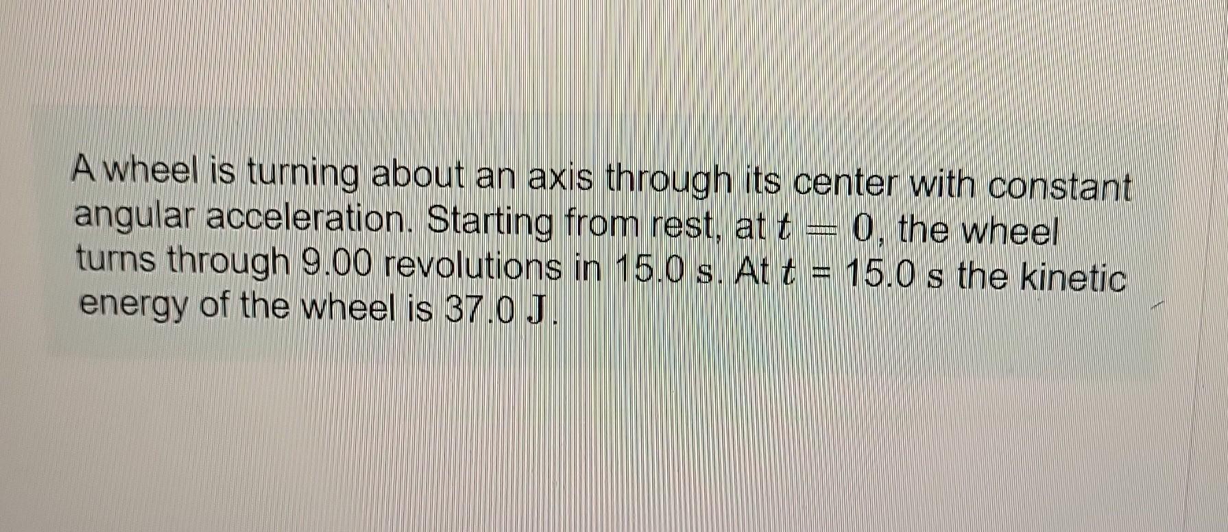 Solved A wheel is turning about an axis through its center | Chegg.com
