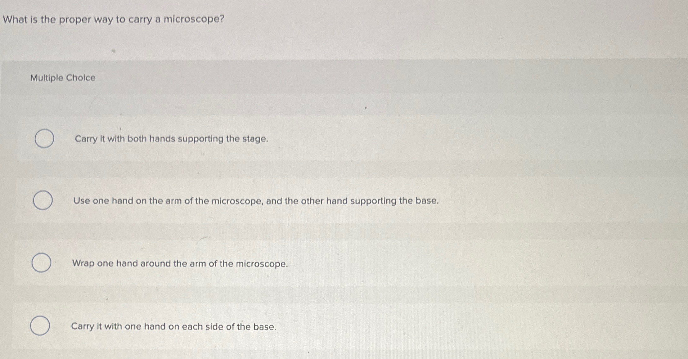 Solved What is the proper way to carry a microscope?Multiple | Chegg.com