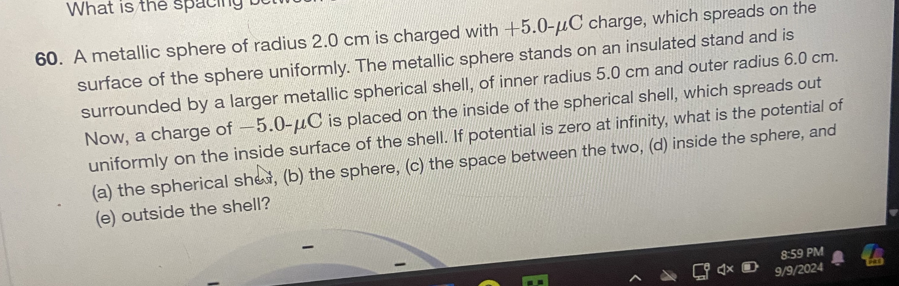 Solved A metallic sphere of radius 2.0 ﻿cm is charged with | Chegg.com