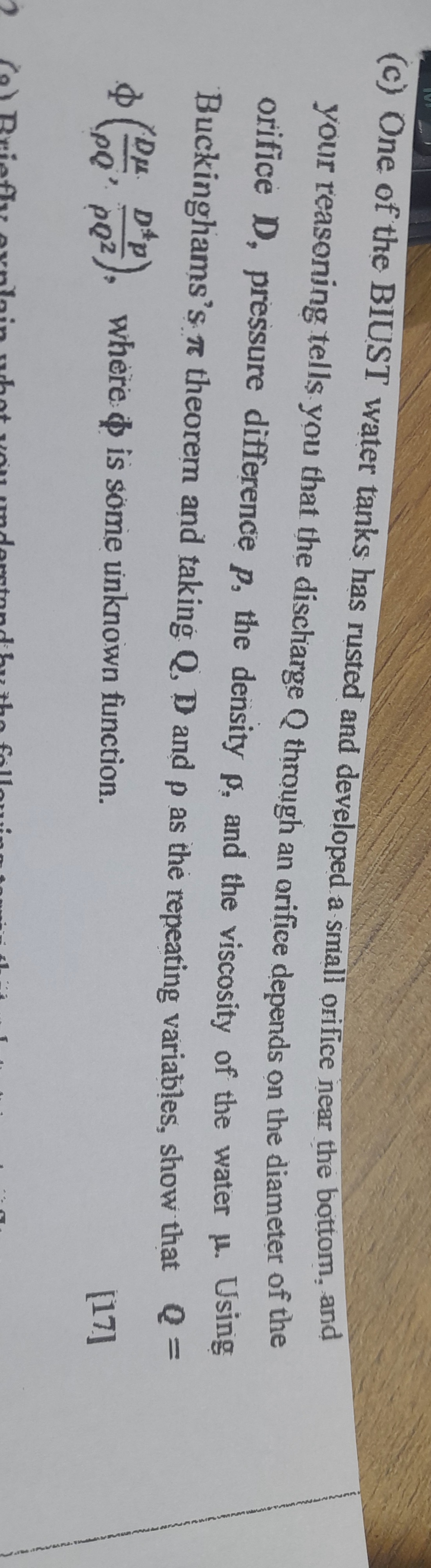 Solved One of the BIUST water tanks has rusted and developed | Chegg.com