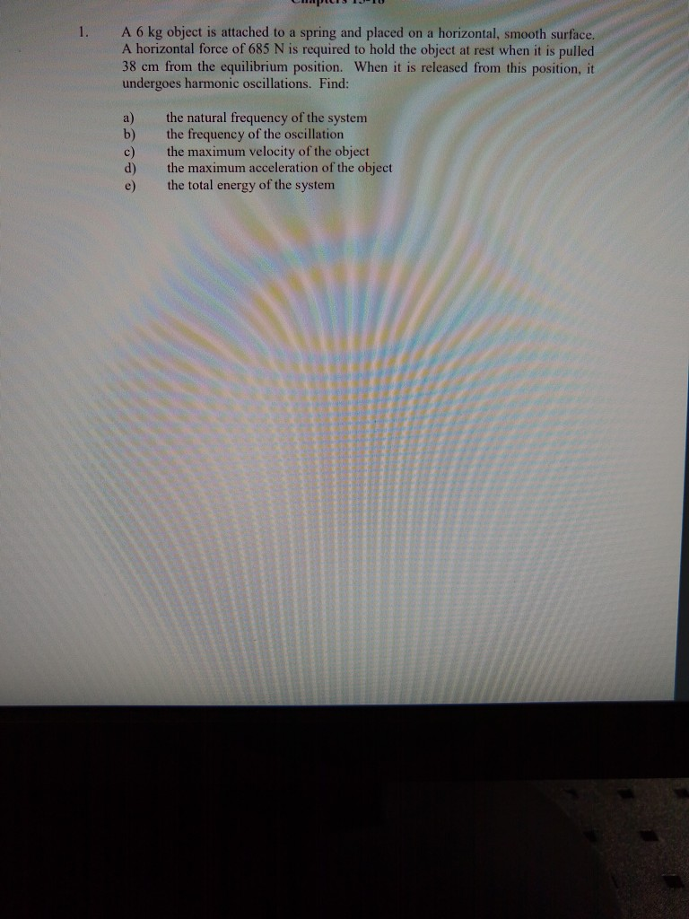 Solved 1. A 6 kg object is attached to a spring and placed | Chegg.com