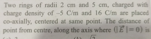 Solved Two rings of radii 2 ﻿cm and 5 ﻿cm , ﻿charged | Chegg.com