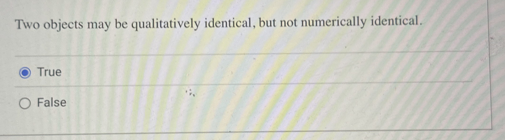 Solved Two objects may be qualitatively identical, but not | Chegg.com