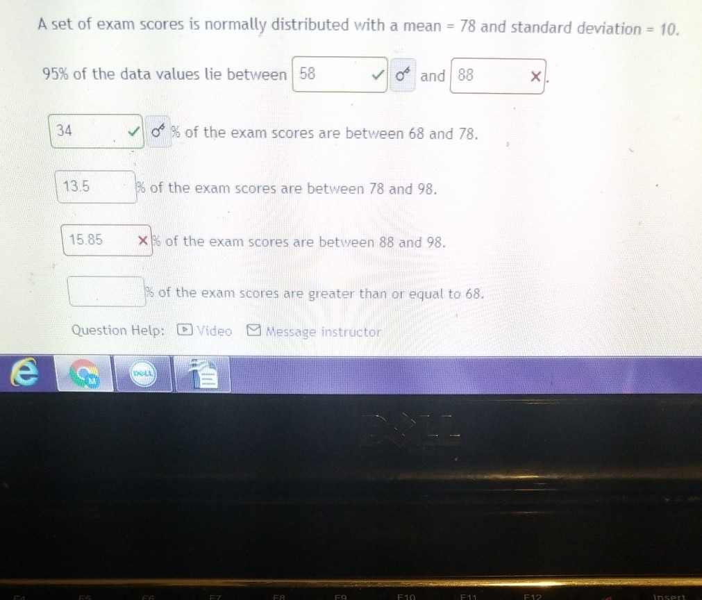 Solved A set of exam scores is normally distributed with a | Chegg.com