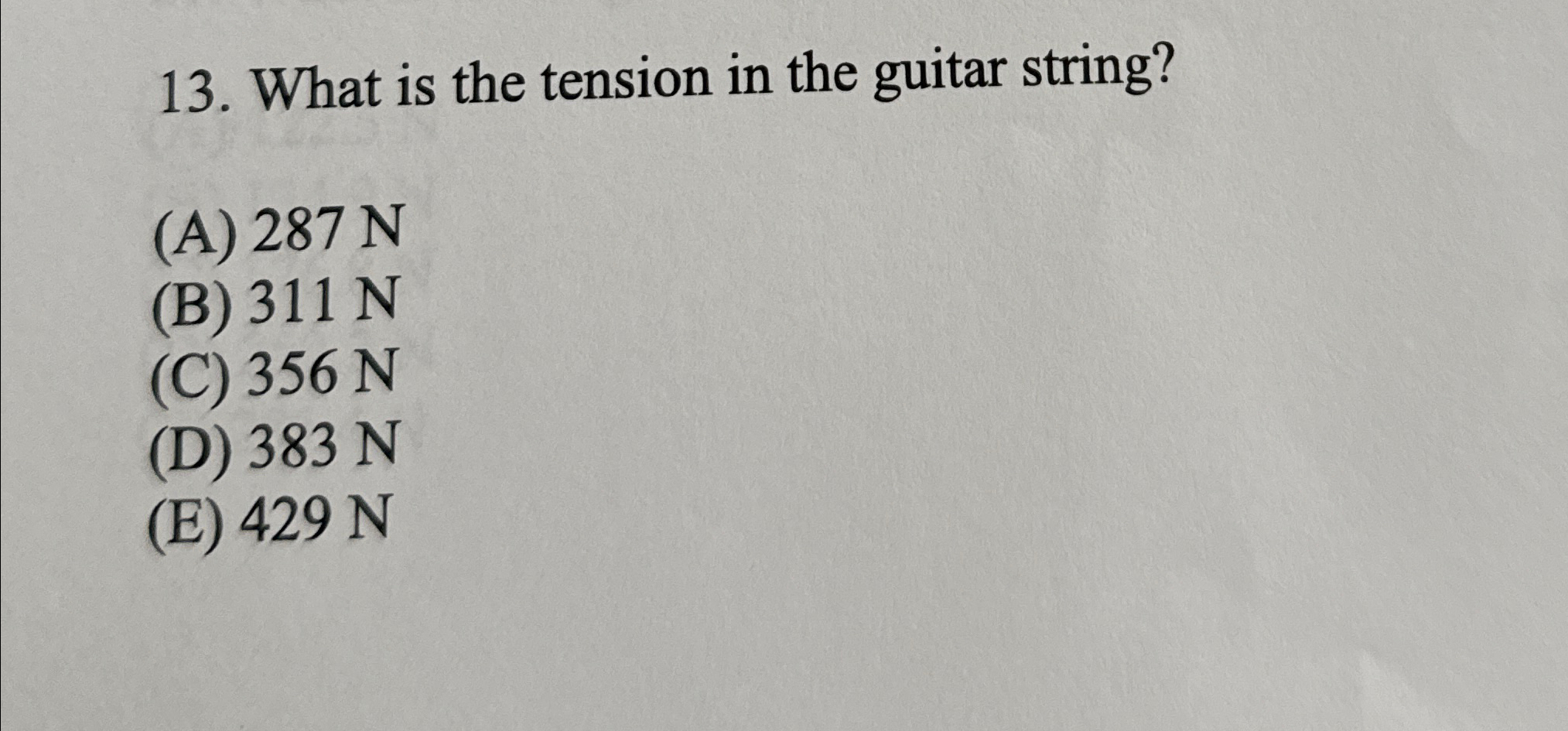 Solved What is the tension in the guitar | Chegg.com