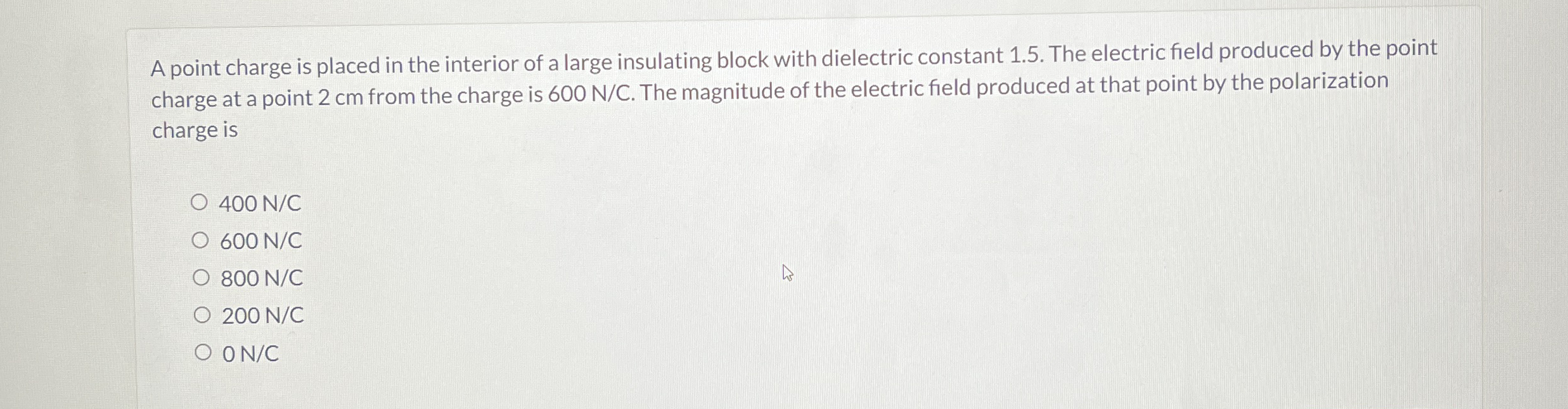 Solved A point charge is placed in the interior of a large | Chegg.com