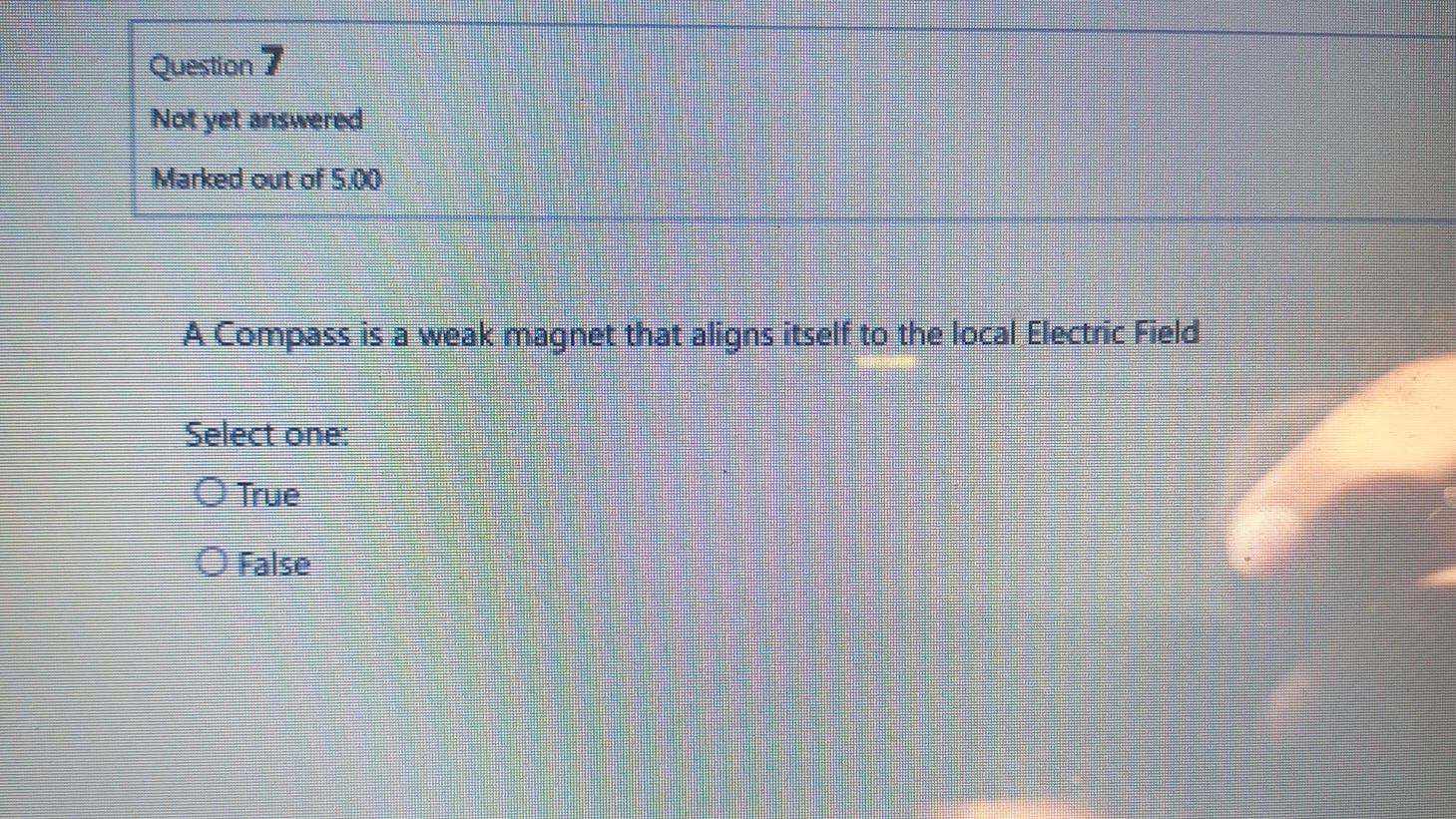 Solved A Compass is a weak magnet that aligns itself to the | Chegg.com
