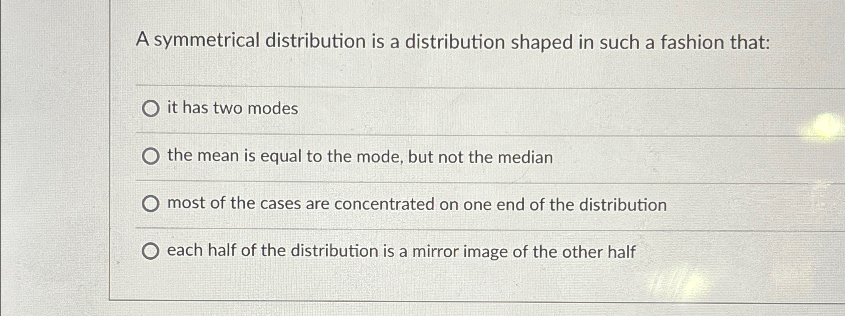 Solved A symmetrical distribution is a distribution shaped | Chegg.com