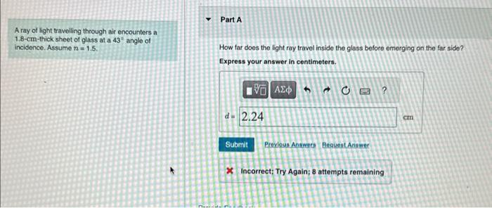 Solved A ray of light travelling through air encounters a | Chegg.com