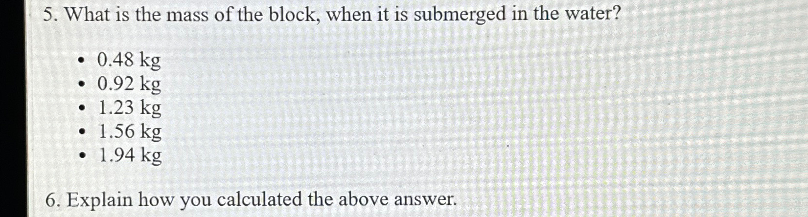 Solved What is the mass of the block, when it is submerged | Chegg.com